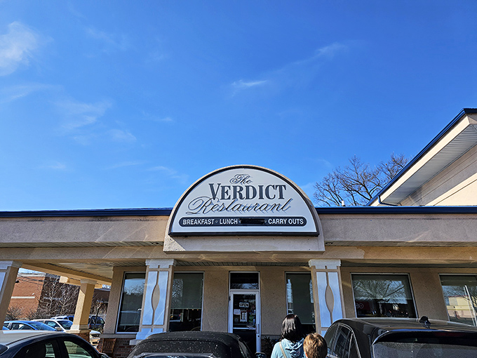 The unassuming blue-topped exterior of Verdict Restaurant in Wheaton hides culinary treasures within. Like finding a great paperback with a modest cover, the real story awaits inside.
