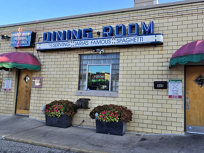 Iaria's unassuming brick exterior might fool you, but locals know this modest facade hides generations of culinary magic waiting just beyond those doors.