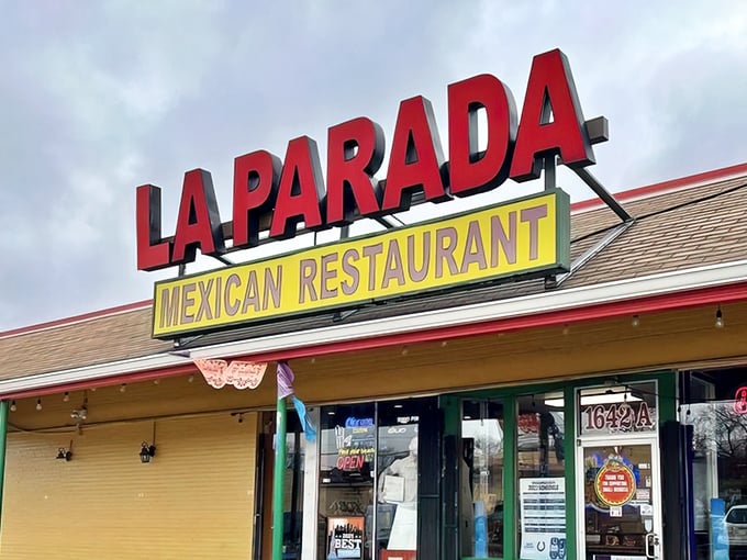 The bold red signage stands out like a beacon of hope for hungry travelers, promising authentic flavors that Instagram filters can't enhance.
