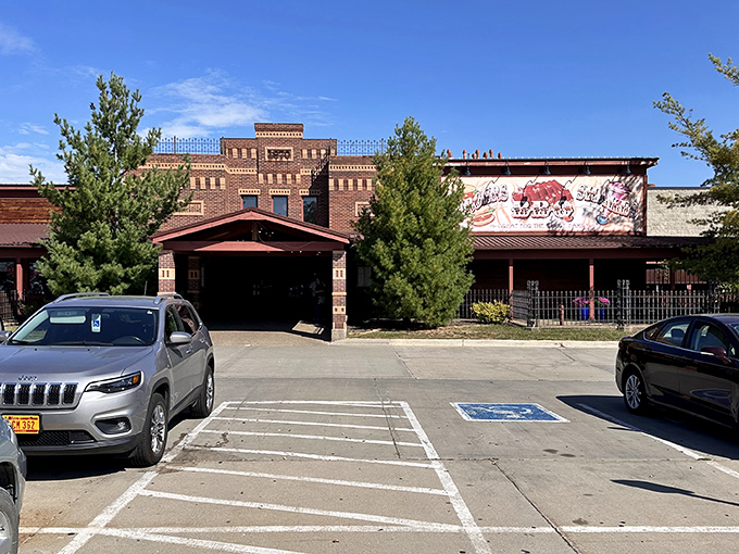 The brick fortress of flavor stands proudly in Ames, a barbecue beacon that's been drawing hungry pilgrims for generations.