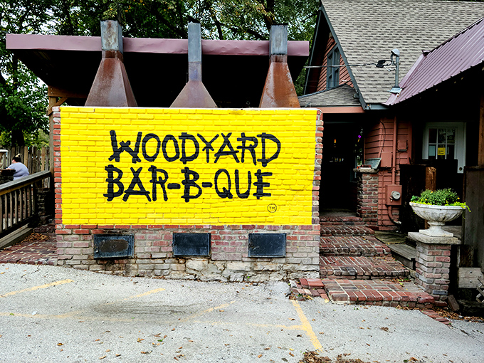 The outdoor patio at Woodyard feels like a backyard cookout where everyone's invited and nobody's counting how many ribs you've devoured.