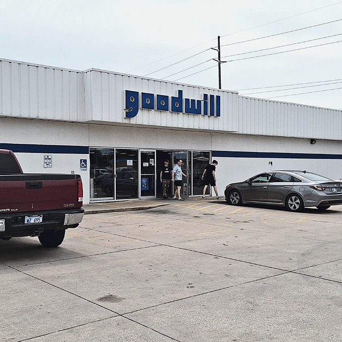 The iconic blue and white facade of Goodwill in Wichita stands like a beacon for treasure hunters. Behind those doors? A universe of possibilities awaits.