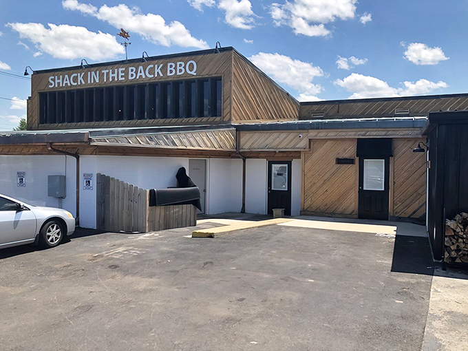 The unassuming wooden exterior of Shack in the Back BBQ proves once again that the best barbecue joints don't waste energy on fancy facades.