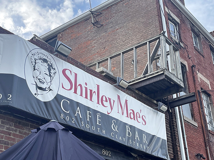 A closer look at the iconic sign that beckons hungry travelers to one of Kentucky's most authentic soul food experiences.