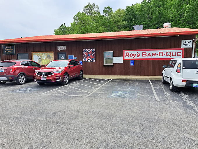 That bold red stripe isn't just decoration &ndash; it's a beacon guiding hungry travelers to barbecue salvation in Russellville.