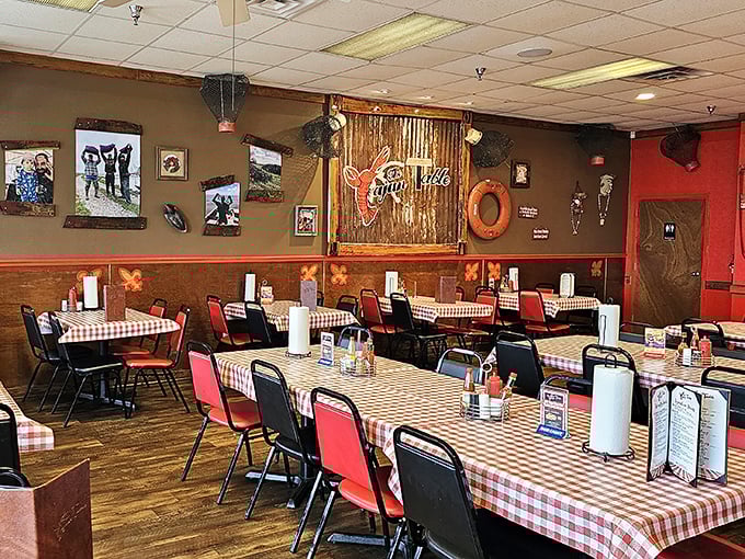 The Cajun Table's exterior glows with promise as dusk settles, its neon crawfish sign beckoning hungry travelers like a lighthouse for flavor-seekers.