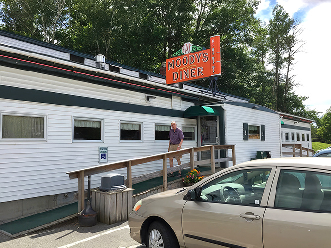 Even the hand-painted ice cream cone on the side knows this isn't just any roadside stop along Route 1.