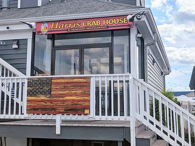 The unassuming exterior of Harris Crab House beckons seafood lovers like a lighthouse calls to ships&mdash;promising delicious treasures within those gray-sided walls.
