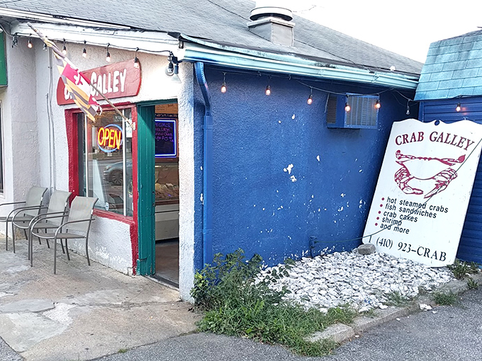 The unassuming blue exterior of The Crab Galley might not scream "culinary destination," but that's exactly how the best seafood secrets stay hidden from tourists.