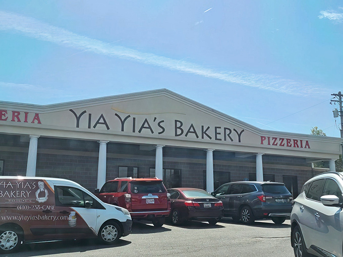 The classic white columns of Yia Yia's Bakery stand like sentinels guarding a treasure trove of sweet secrets within. Maryland's dessert paradise awaits!