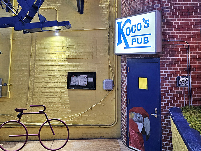 The bright yellow wall and blue door with a parrot painting aren't subtle hints &ndash; this place knows flavor doesn't need to whisper.