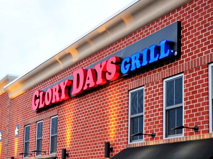 The brick facade and bold signage of Glory Days Grill promises what every sports fan secretly craves: good food without the pretension.