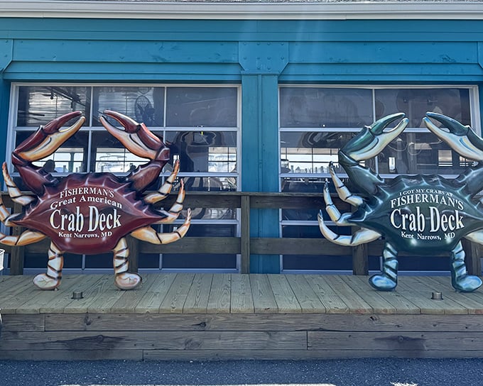 Those giant crab sculptures aren't just decoration&mdash;they're sentinels guarding the gateway to seafood paradise. Blue building, blue crabs, blue skies ahead.