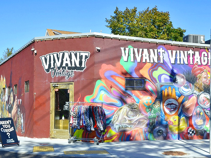 The burgundy building with psychedelic murals isn't just a store&mdash;it's a portal to decades past. Vivant Vintage's exterior promises treasures within.
