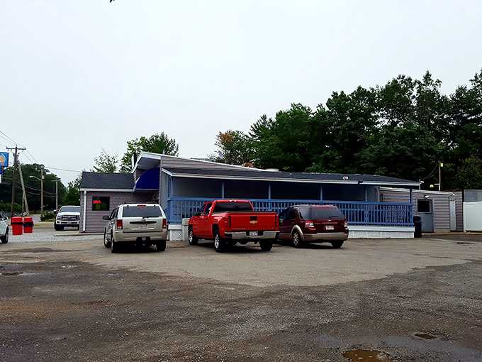 The unassuming exterior of Kay's Dairy Bar stands like a beacon of seafood hope in Westminster, where pickup trucks gather like hungry pilgrims at a culinary shrine.
