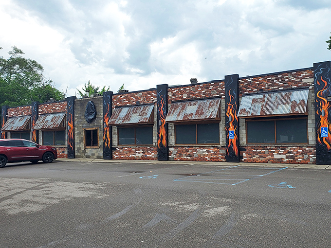 Flames painted on pillars aren't just decoration&mdash;they're a warning. Your taste buds are about to experience a delicious inferno of Michigan barbecue magic.