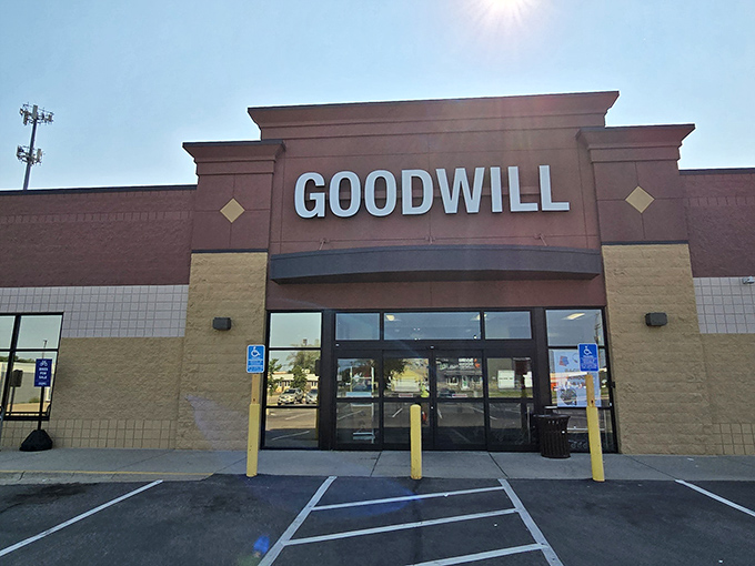 The unmistakable beacon of bargain hunters everywhere—Goodwill's Waite Park storefront promises treasure inside those automatic doors.