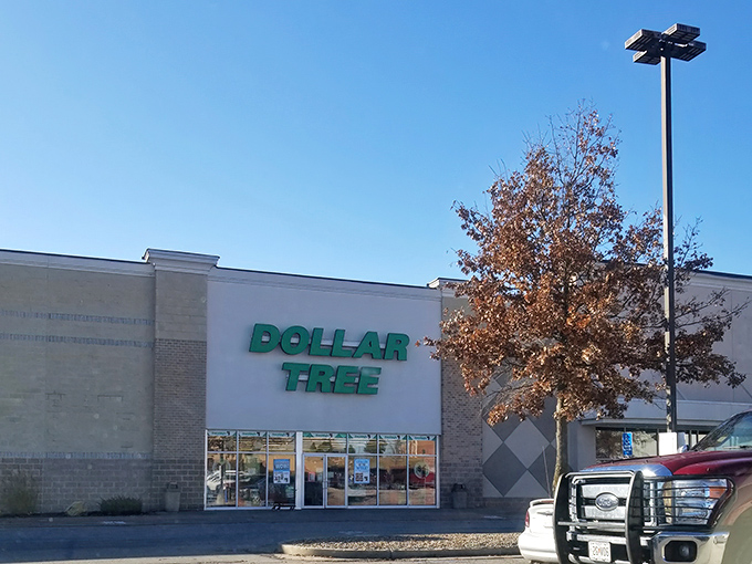 The iconic green signage of Dollar Tree stands out against the clear Missouri sky, beckoning bargain hunters like a retail lighthouse.