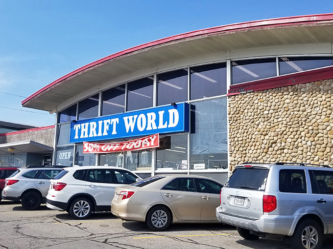 The iconic curved roof and bold blue sign of Thrift World stands like a beacon for bargain hunters across Nebraska.