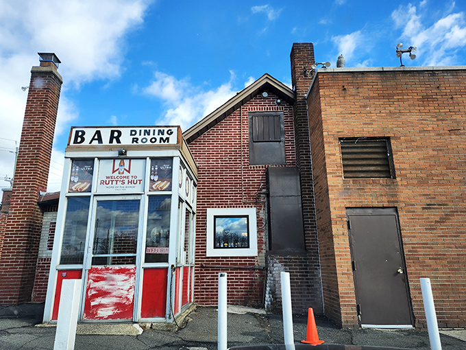 The iconic red brick exterior of Rutt's Hut stands like a temple to deep-fried deliciousness in Clifton.