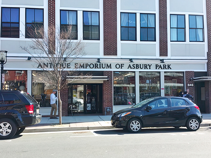 The Antique Emporium's classic brick-and-awning exterior stands as a portal to the past amid Asbury Park's ongoing renaissance.