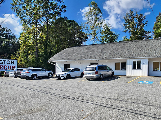 The unassuming white exterior of Lexington Barbecue—proof that the best food experiences often hide behind the most modest facades.