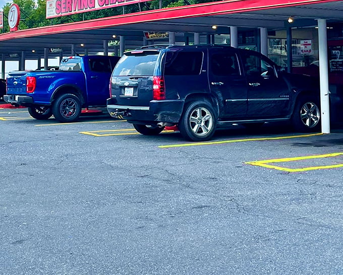 The classic red-trimmed canopy of South 21 has sheltered hungry Charlotteans from sun and rain since Eisenhower was signing bills. Time travel never tasted so good.
