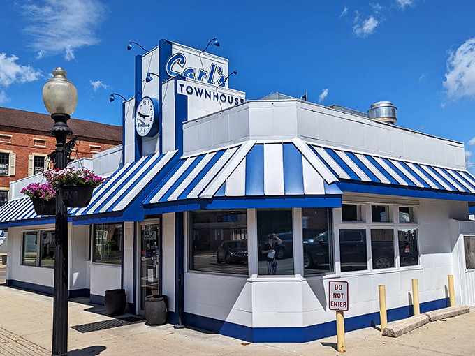 The blue and white striped awning of Carl's Townhouse stands like a beacon for hungry travelers in downtown Chillicothe.