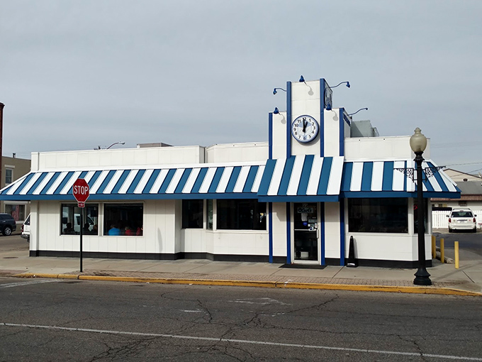 The iconic blue and white exterior of Carl's Townhouse stands like a time capsule in downtown Chillicothe, beckoning hungry travelers with its classic American diner charm.