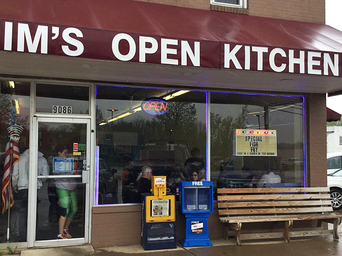 The unassuming exterior of Jim's Open Kitchen Too, where the line of hungry patrons tells you everything you need to know about what awaits inside.