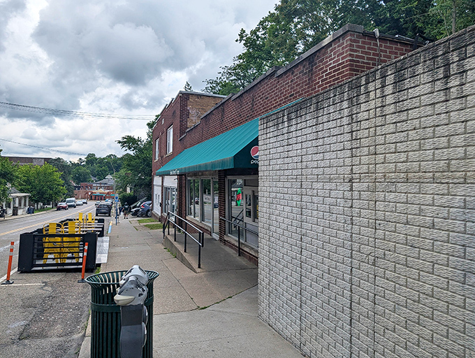 That turquoise awning beckons like a siren song, promising burger salvation just beyond those welcoming glass doors.