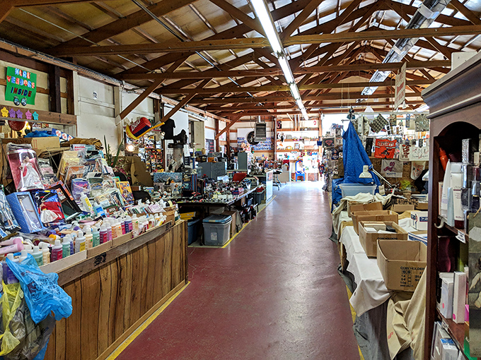 Wooden beams and rustic charm create the perfect treasure-hunting atmosphere, where every aisle promises discoveries that big-box stores could never deliver.