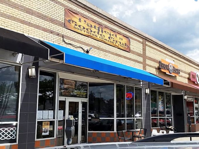 The unassuming storefront with its bright blue awning is like finding a treasure map where X marks the spot for barbecue bliss.