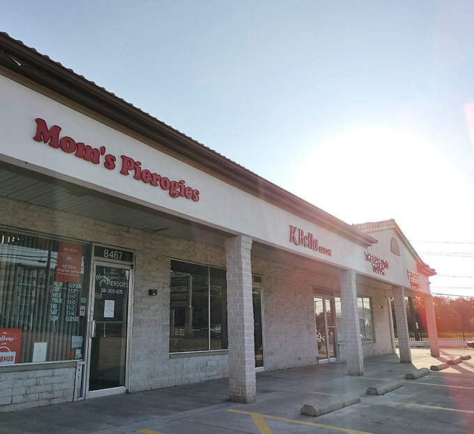 The unassuming storefront of Mom's Pierogies in Brooklyn, Ohio &ndash; where culinary magic happens behind a modest strip mall facade.