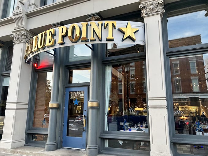 The golden "BLUE POINT" sign beckons seafood lovers like a lighthouse guiding ships to safe harbor. Cleveland's Warehouse District never looked so appetizing.