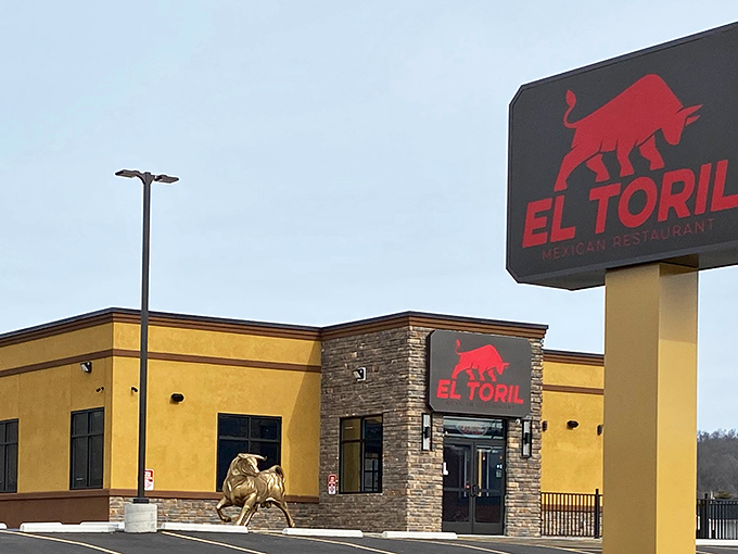The golden exterior of El Toril stands proudly against the Ohio sky, its red bull logo promising authentic flavors that'll have you saying "ol&eacute;!"
