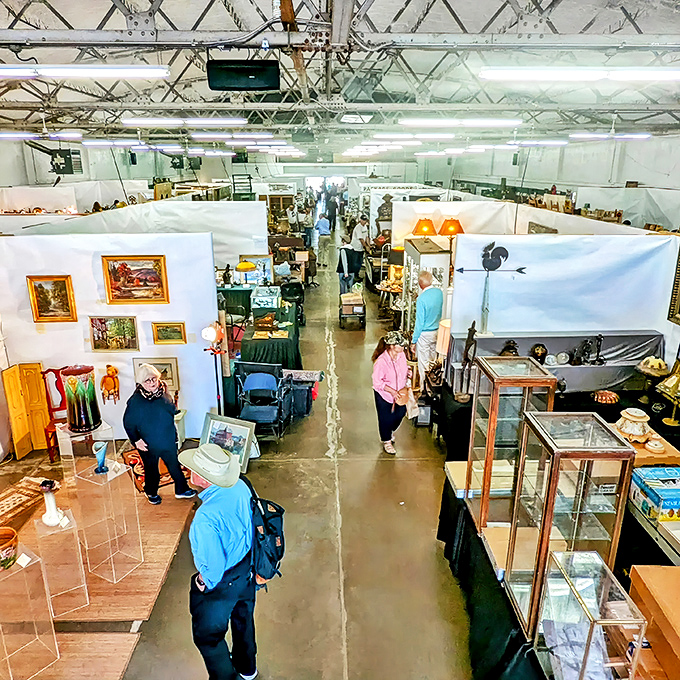 Indoor vendors line pristine white booths, creating a labyrinth of possibility where yesterday's treasures await their second act.
