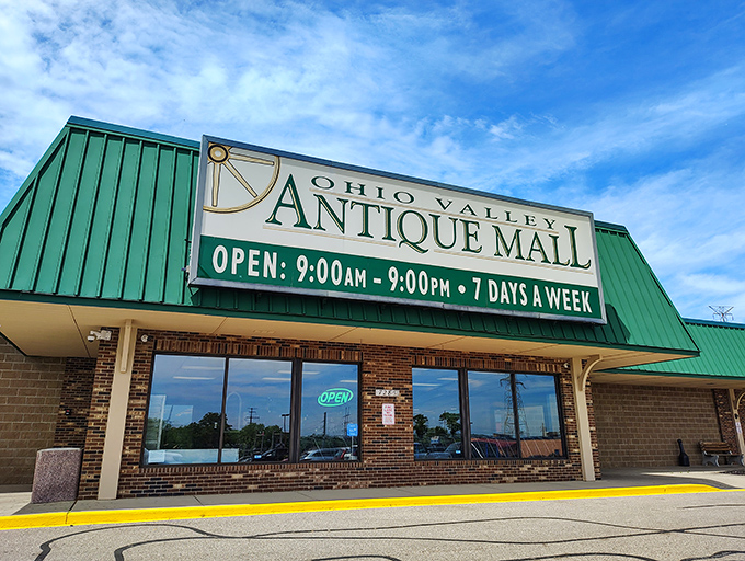 The iconic green-roofed entrance to Ohio Valley Antique Mall stands ready to welcome treasure hunters seven days a week, like a portal to the past waiting to be explored.