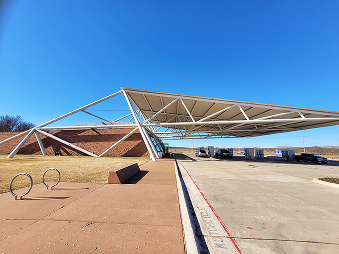 Step into the future of nostalgia with POPS' dramatic entrance, where angular steel and glass welcome hungry travelers with a promise of Route 66 reimagined.