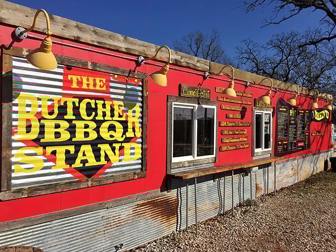 The bright red exterior of The Butcher BBQ Stand isn't just eye-catching&mdash;it's a smoke signal to barbecue pilgrims that they've reached the promised land.