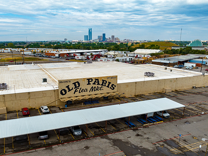 The Oklahoma City skyline watches over Old Paris Flea Market like a proud parent, its unassuming exterior hiding the treasure trove that awaits inside.