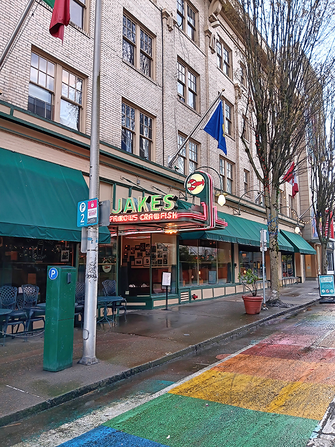 The iconic Jake's Famous Crawfish stands proudly on Portland's rainbow-painted street, a seafood sanctuary that's weathered trends and fads like a sturdy lighthouse.