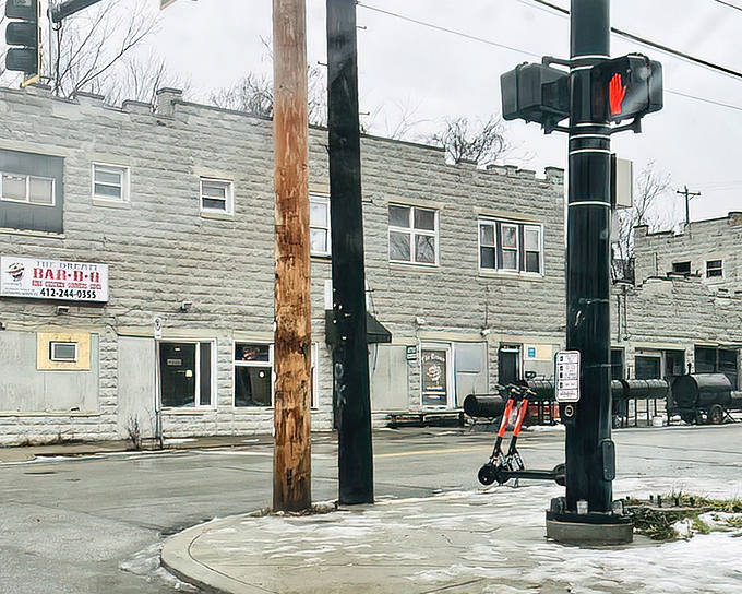 The unassuming exterior of The Dream BBQ in Pittsburgh's Homewood neighborhood. True culinary treasures often hide in plain sight.