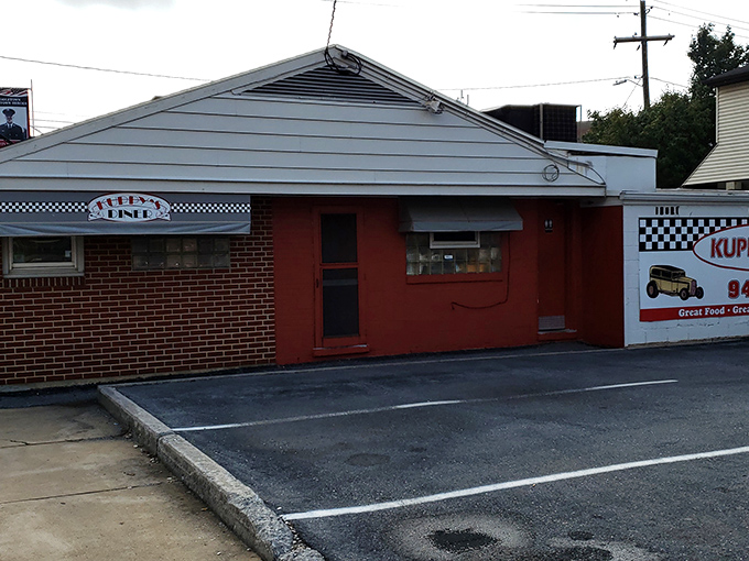 Approaching Kuppy's is like spotting an old friend in a crowd&mdash;that distinctive red facade and classic diner signage instantly signal you're in for an authentic experience.