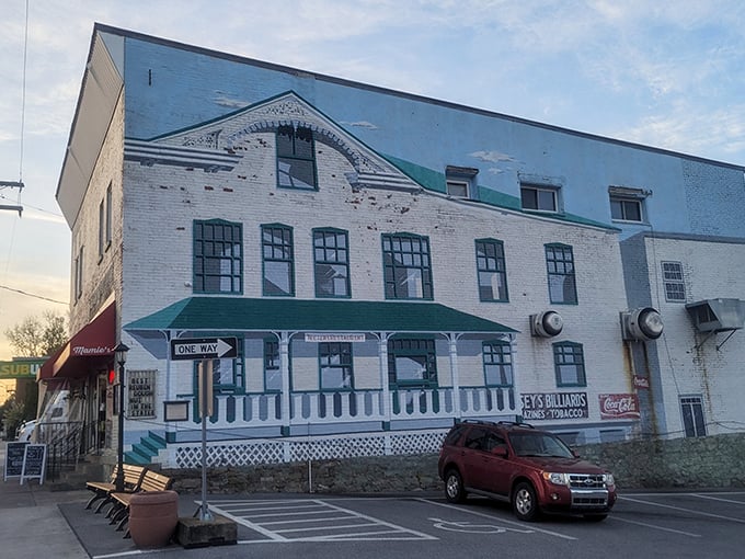 The historic white building with its distinctive blue roof and welcoming porch stands like a culinary lighthouse in Martinsburg, beckoning hungry travelers to dock for breakfast.