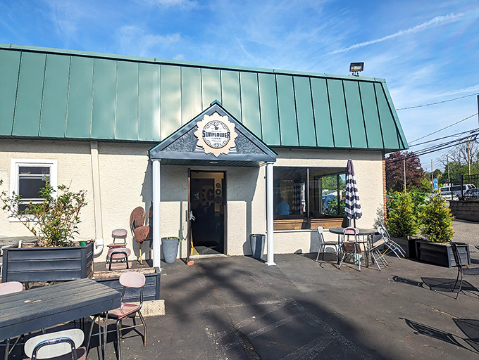 A cheerful green roof crowns this breakfast haven, where the patio beckons with the promise of coffee and Pennsylvania morning breezes.