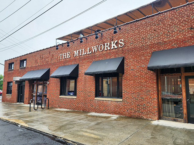 The brick facade of The Millworks stands like a culinary fortress in Harrisburg's Midtown, promising delicious adventures behind those unassuming doors.
