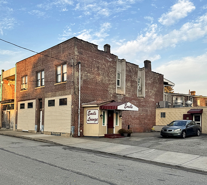 Emil's Lounge stands proudly on a Rankin corner, its unassuming brick exterior hiding culinary treasures that have drawn food lovers for generations.