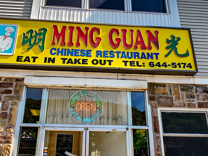 The bright yellow sign beckons like a culinary lighthouse in coal country, promising authentic flavors that stand out against Pennsylvania's winter gray.