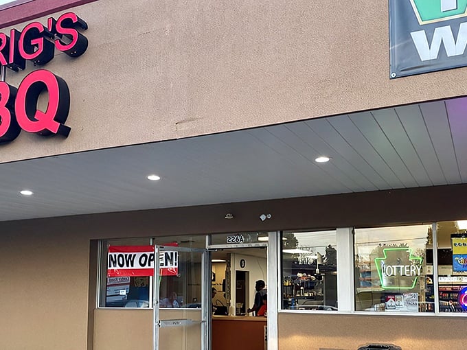 The unassuming tan fa&ccedil;ade with bold red lettering says everything you need to know: this place prioritizes smoke over style. Culinary treasures often hide in plain sight.